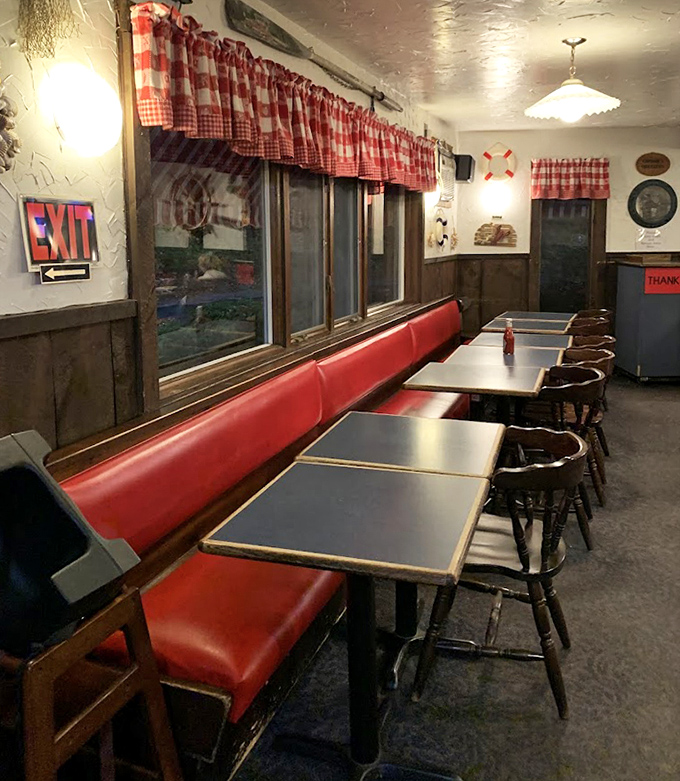 Red vinyl booths and nautical touches create the perfect backdrop for seafood feasting. No distractions from the main event.