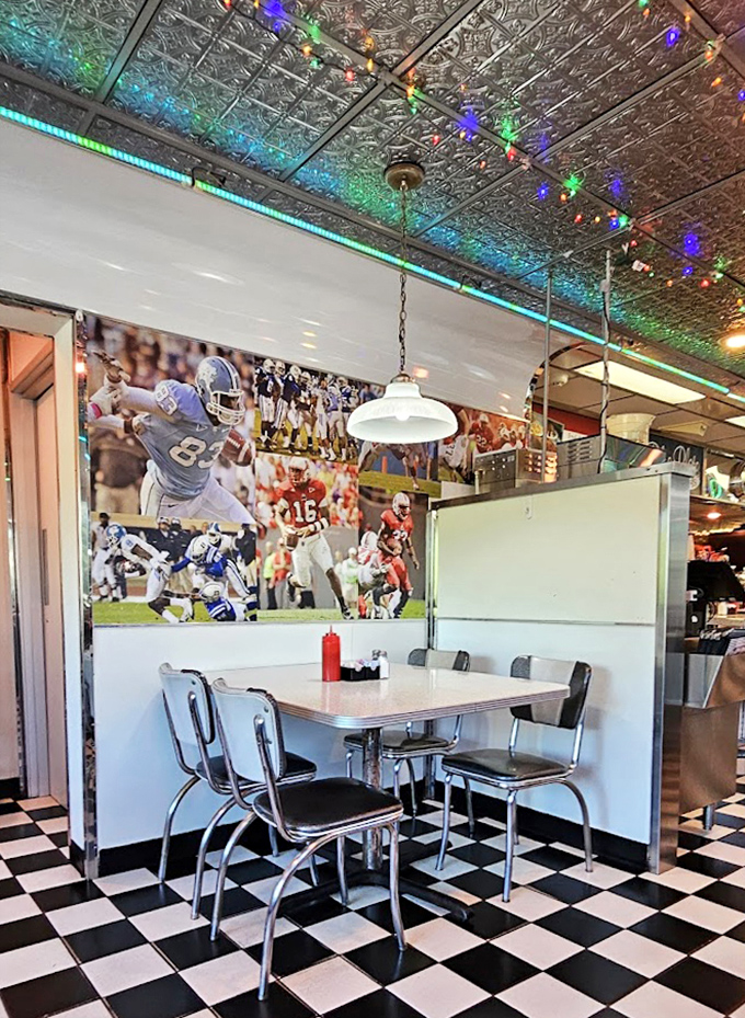 Sports memorabilia watches over diners like patron saints of leisure, blessing your meal with local team spirit.