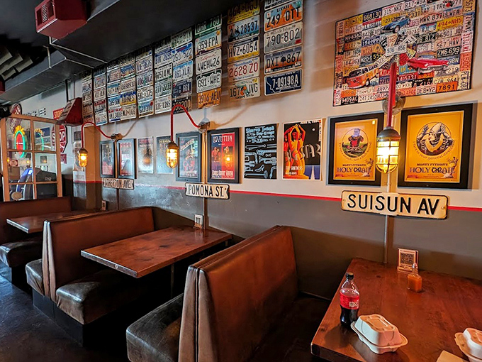 License plates and vintage signs transform dining booths into time machines. Each table offers a journey through California's roadside history while you feast.