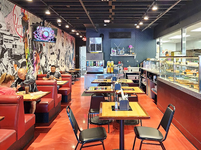 The dining room's vibrant red booths and wooden tables create the perfect backdrop for the main event: whatever delicious dish you've ordered.