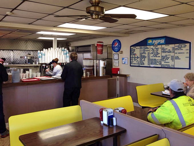 The counter where magic happens. Where orders are shouted in a dialect only short-order cooks understand, and miracles emerge on paper-lined trays.