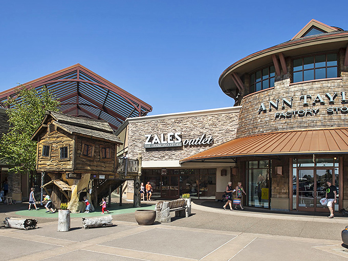 Zales and Ann Taylor anchor the outdoor plaza, where stone facades and thoughtful landscaping elevate the outlet experience.
