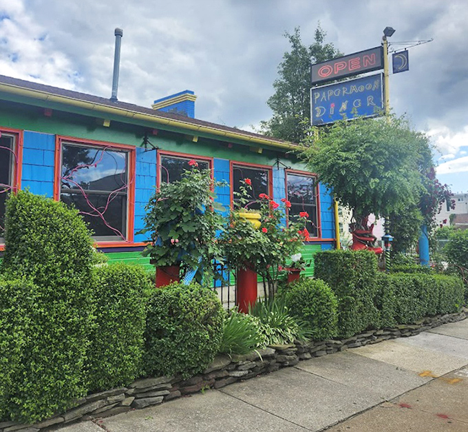The blue exterior with vibrant trim looks like it was painted by someone who refused to choose a favorite color. Baltimore's happiest building.