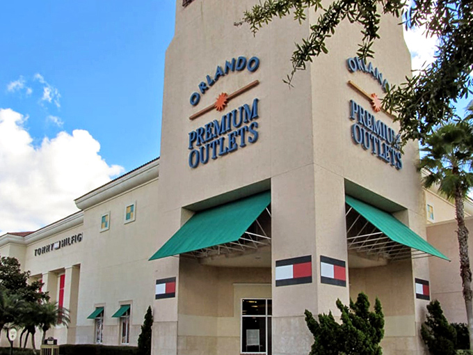 The Tommy Hilfiger storefront proudly displays its heritage&mdash;a beacon of preppy style at prices that won't require a second mortgage.