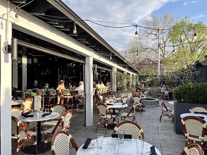 Outdoor dining that feels like you've discovered a secret garden where steaks are served and cocktails flow freely.