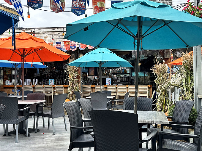 The outdoor patio offers a breezy escape with colorful umbrellas&mdash;perfect for summer evenings with a cold beer.