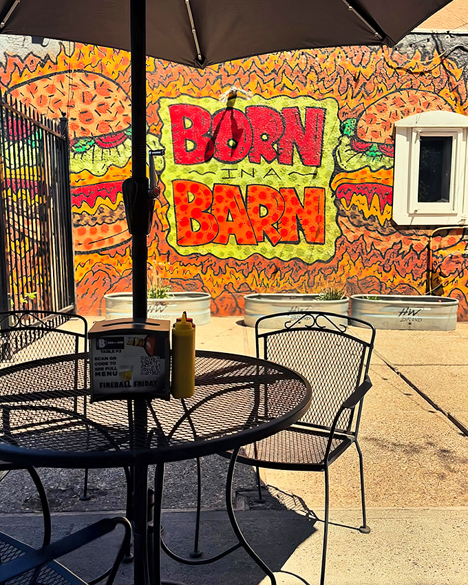 Burger joint by day, vibrant canvas by night. The outdoor patio's mural adds a splash of color to Laramie's culinary landscape.