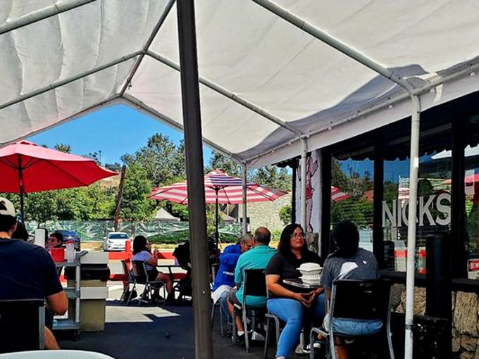 The outdoor patio: where LA sunshine meets breakfast bliss under a canopy of casual conversation.
