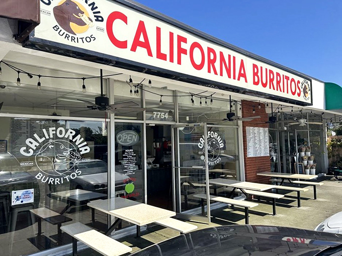 The outdoor tables offer front-row seats to the simple pleasure of watching your burrito dreams come true under San Diego skies.