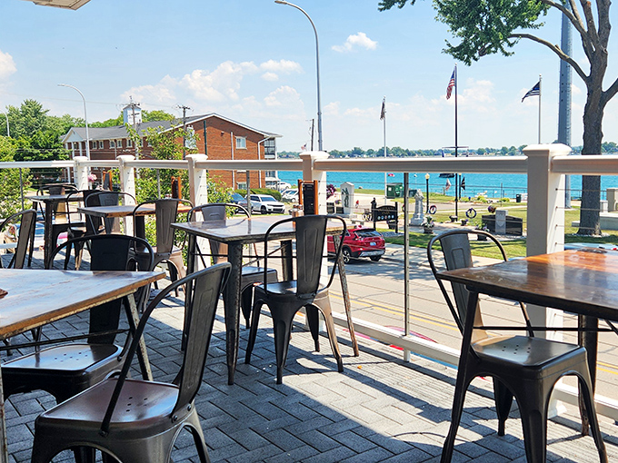 Outdoor seating that transforms an ordinary meal into a mini-vacation, with river breezes that season every bite with pure Michigan magic.