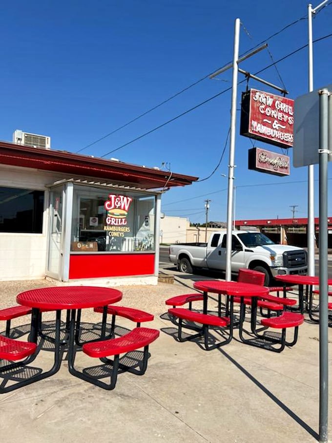 Even on sunny days, those cherry-red outdoor tables invite you to enjoy your burger with a side of fresh air and small-town charm.