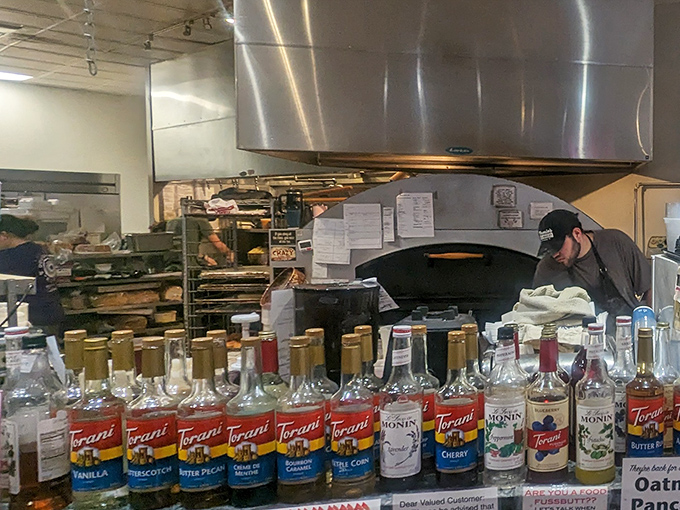 That kitchen window offers a glimpse into the magical realm where ordinary ingredients transform into extraordinary meals worth driving across state lines for.