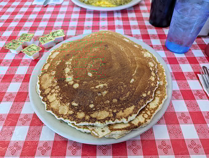 Pancakes the size of hubcaps with that perfect golden-brown exterior. These aren't just breakfast&mdash;they're an engineering achievement worthy of study.
