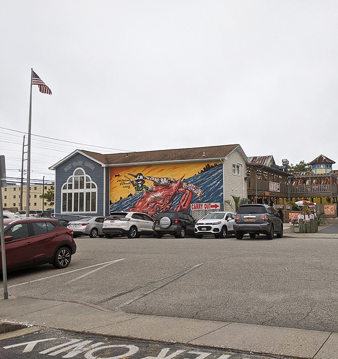 That colorful mural turns a simple parking lot into an artistic preview of the seafood adventure waiting inside.