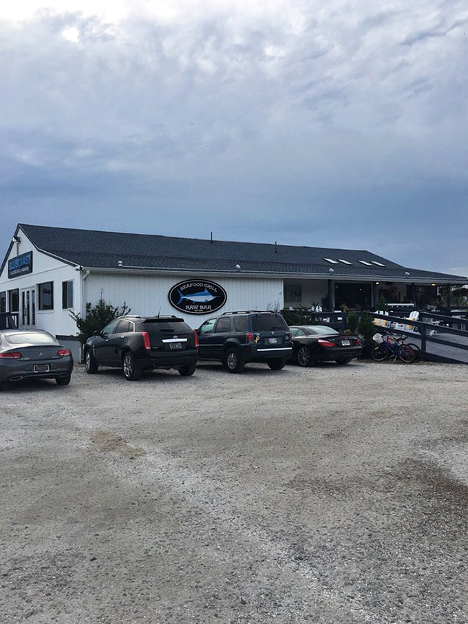 Even on cloudy days, Bluecoast's gravel lot fills with cars bearing license plates from all over &ndash; pilgrims to seafood paradise.