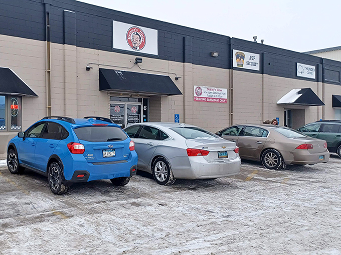 Even in snow and ice, full parking spaces tell the real story—North Dakotans know where to find breakfast worth braving the elements for.