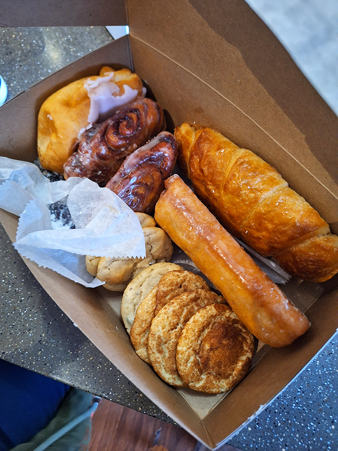 A beautiful collection of pastries that could easily derail anyone's diet plans without a moment's hesitation or regret.