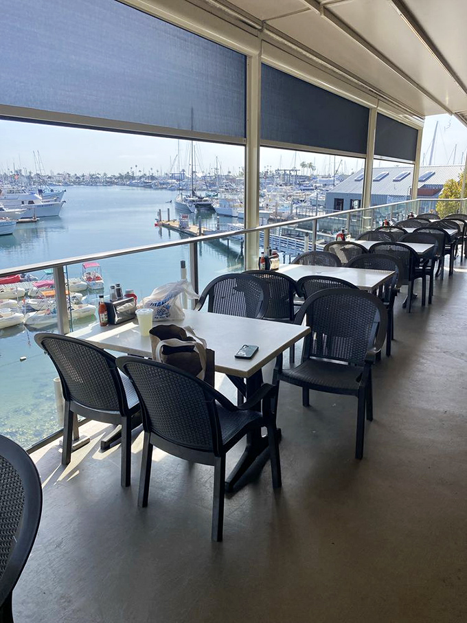 Waterfront dining with a side of boat envy. These seats offer dinner and a show starring San Diego's finest vessels.