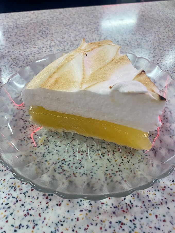 Lemon meringue pie that makes you understand why people used to cool these on windowsills. Worth every calorie and then some.