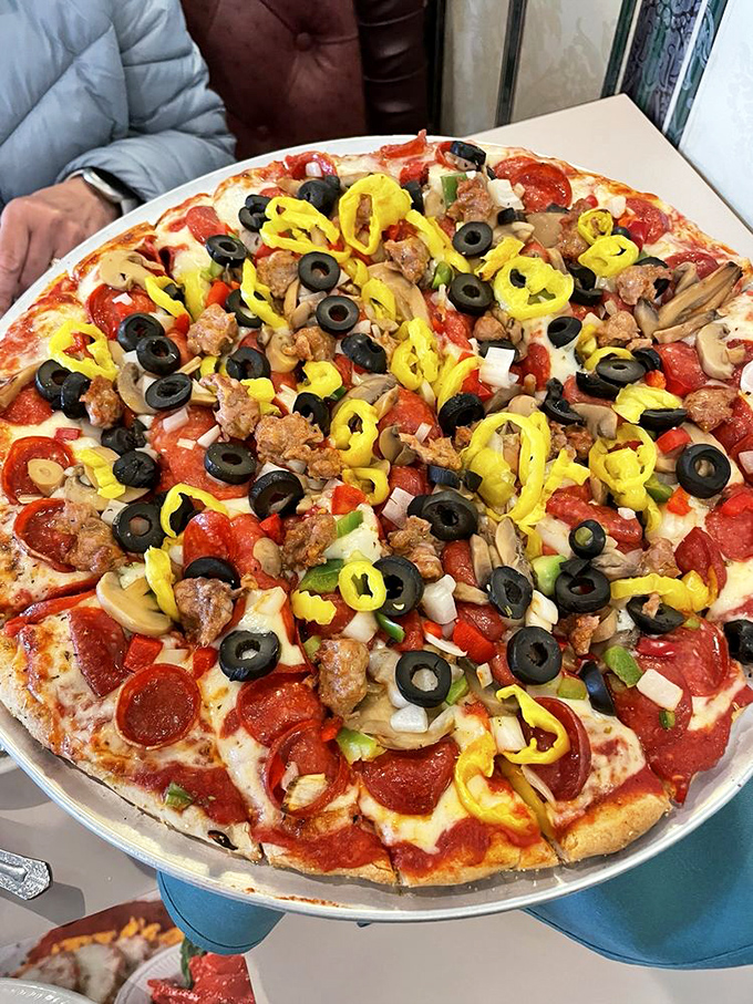 A pizza that doesn't know the meaning of "less is more"&mdash;topped with enough goodies to make minimalists weep with joy.