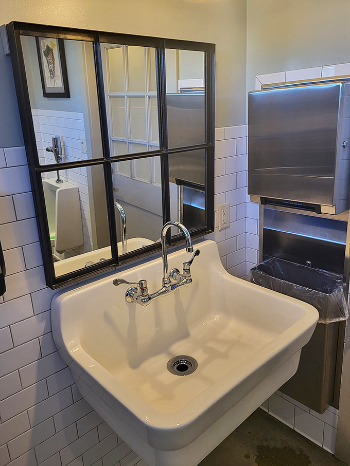 The bathroom sink isn't just clean&mdash;it's Instagram-worthy, with subway tiles and industrial fixtures that say "we care about every detail."