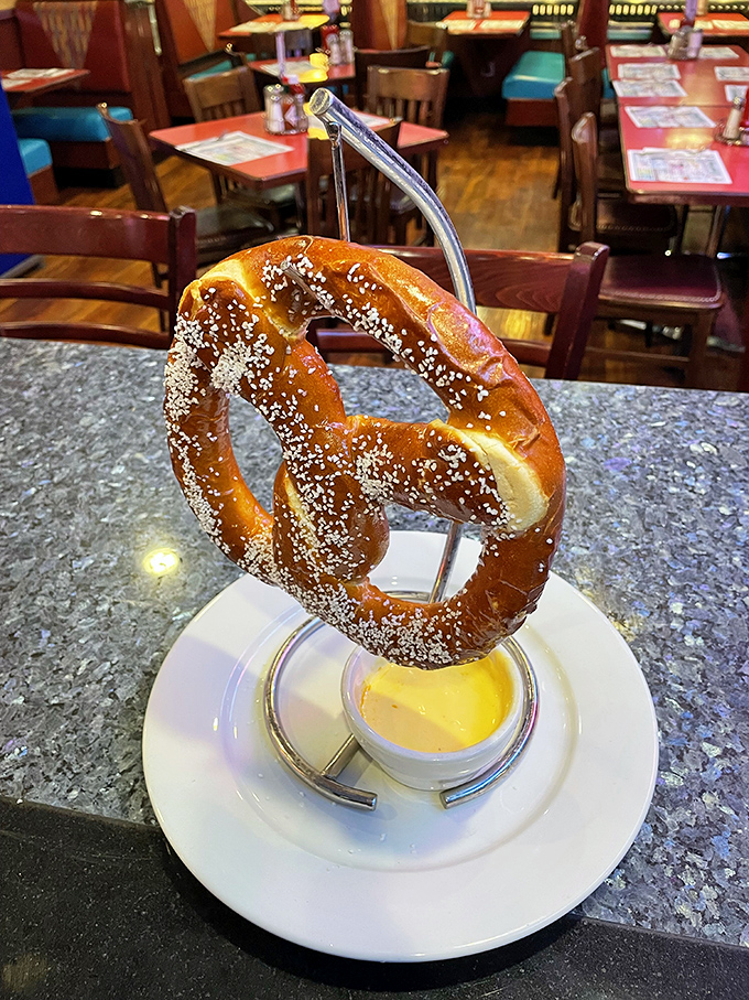 Not just any pretzel&mdash;a pretzel that's been to the gym. Served hanging like edible jewelry with a side of liquid gold dipping sauce.