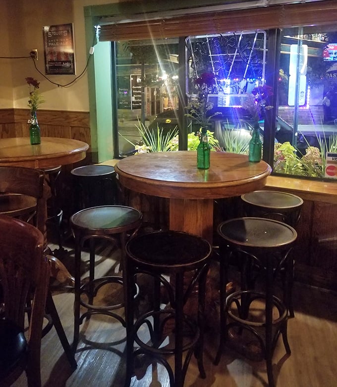 High-top tables by the window&mdash;the perfect perch for people-watching while contemplating whether you really need that second order of fish and chips.