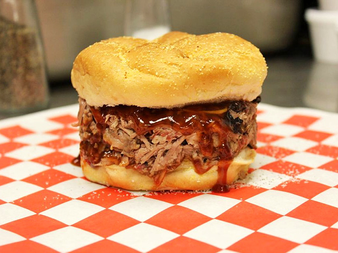 A pulled pork sandwich that requires both hands and several napkins. The golden rule: if it's not messy, it's not right.