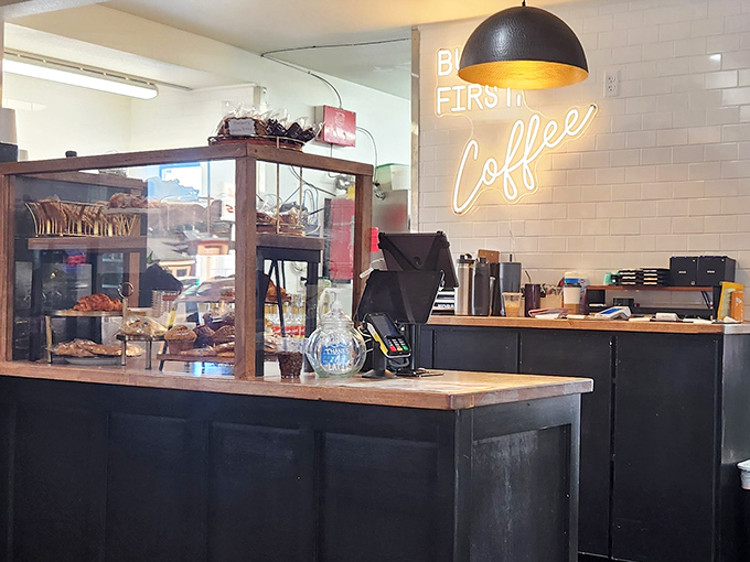 "But first, coffee" isn't just a sign&mdash;it's a life philosophy. The pastry case stands guard, tempting even the most determined "just-coffee" customers.