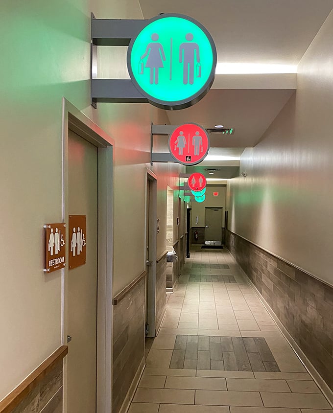 Even the restroom corridor at Castle Rock Outlets shows attention to detail. Those alternating green and red lights are like runway guidance for urgent situations.