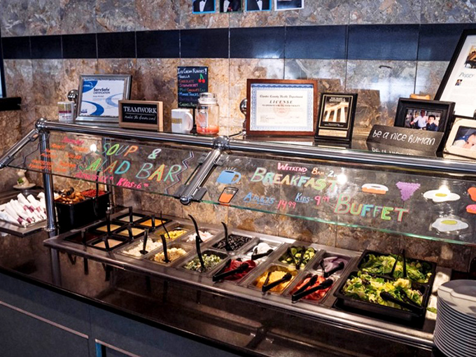 The salad bar offers a colorful array of fresh options for those who want to pretend they're being healthy before ordering dessert.