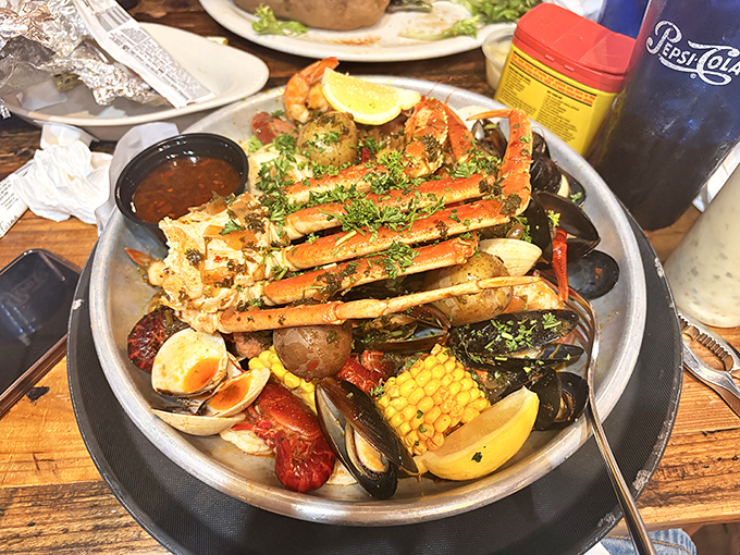 Not just a seafood platter—a maritime festival where crab legs are the headliner and corn on the cob plays enthusiastic backup.