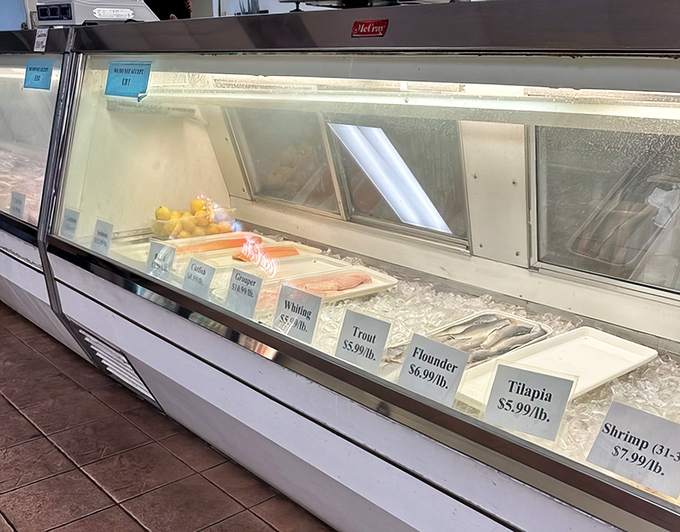 Fresh catches labeled with military precision. This display case is the seafood equivalent of "choose your own adventure."