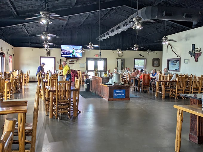 Rustic wooden tables and chairs say, "Stay awhile, pardner." No one's rushing you out the door when the seating looks this inviting.