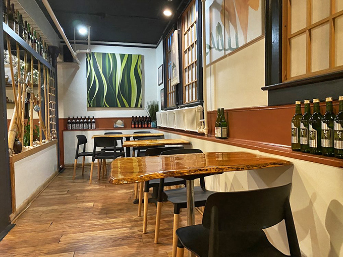 Live-edge wooden tables and minimalist design create dining spaces that feel both modern and timeless.