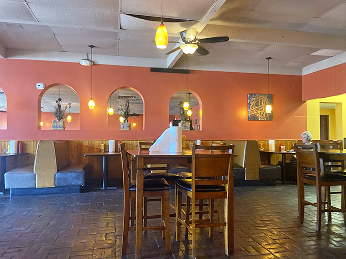 Booth seating that invites you to settle in and forget about that diet you were considering. Those pendant lights are setting the mood.
