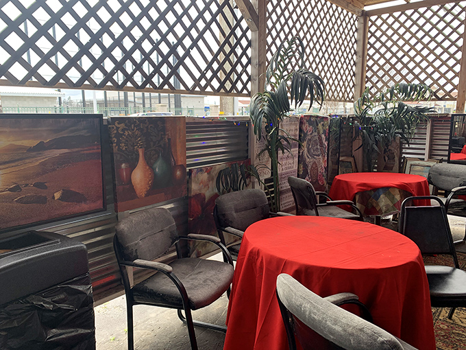 Red tablecloths pop against gray chairs in the covered patio area&mdash;a casual setting for serious eating where conversations flow as freely as the sweet tea.