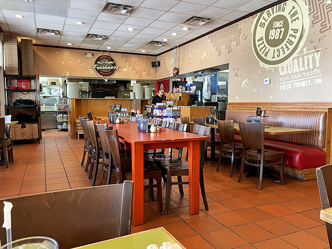 The dining room has that perfect "neighborhood joint" feel, where families gather and pizza traditions are born.