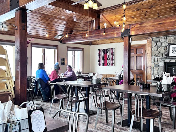 Wooden beams frame conversations between diners who came as strangers but might leave as friends.