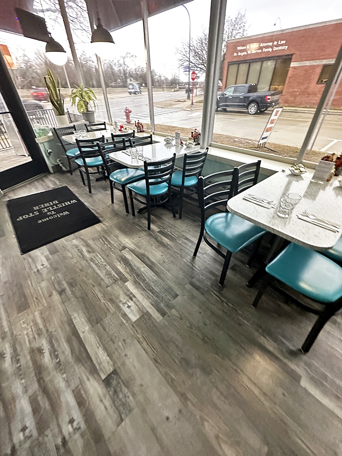 The dining area isn't just filled with tables&mdash;it's lined with front-row seats to Woodward Avenue's daily parade, all bathed in Michigan's mercurial natural light.
