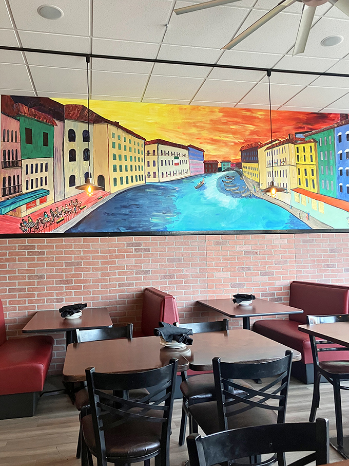 That vibrant Venetian canal mural transforms an ordinary dining space into somewhere special. Suddenly your chicken parm comes with a side of Italian daydreaming.