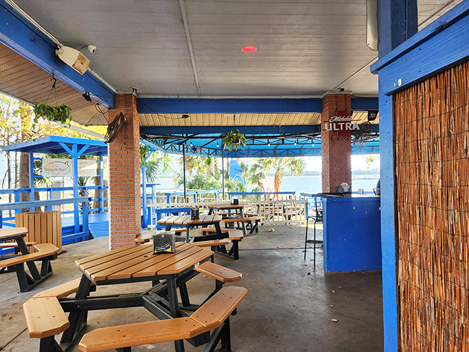 Picnic tables with a million-dollar view. The bamboo screens aren't just decorative &ndash; they're strategic wind-blockers for those perfect hair selfies.