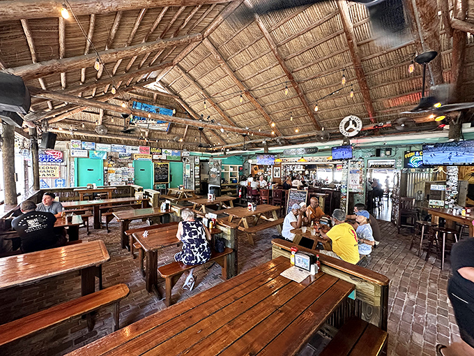 Wooden picnic tables under a thatched roof&mdash;where conversations between strangers turn into friendships and seafood turns into memories.