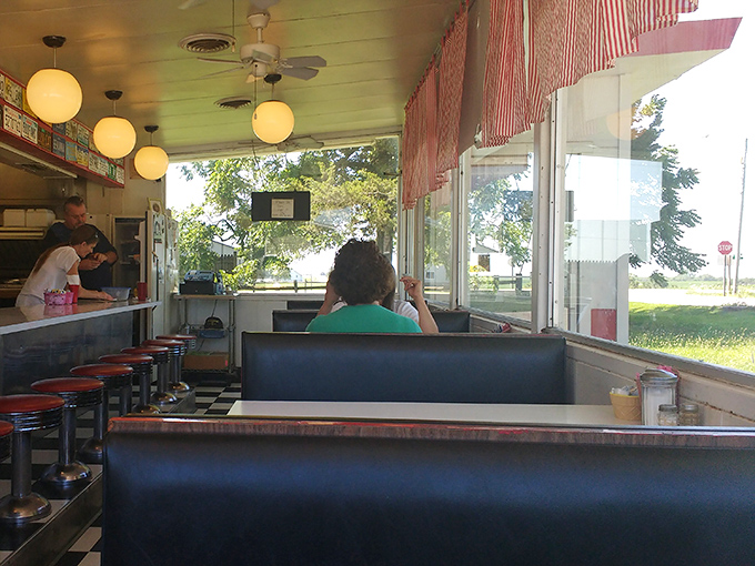 Blue booths and large windows create the perfect setting for both people-watching and plate-clearing with equal enthusiasm.
