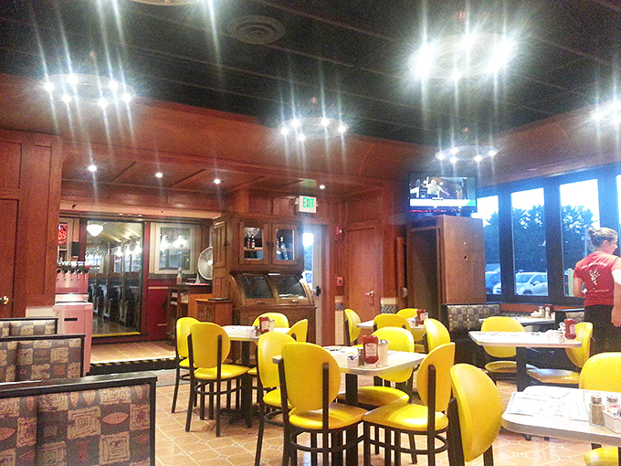 Bright yellow chairs pop against warm wood tones, creating the perfect backdrop for maple-syrup-soaked conversations and coffee refills.