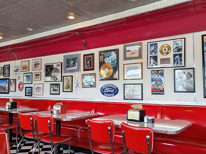 Red vinyl booths beneath walls of memorabilia create the perfect backdrop for conversations that flow as easily as the bottomless coffee refills.