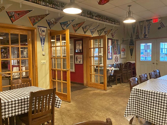 Pennants, wooden doors, and the promise of satisfaction—this dining area has hosted more happy meals than a certain clown ever dreamed possible.