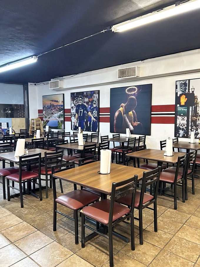 Sports-themed wall art watching over diners – silent witnesses to countless "mmms" and "oh my goodness" utterances between satisfying bites.