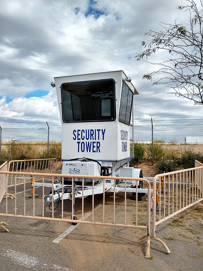 The security tower watches over the empire of discounts, standing sentinel so you can shop in peace and safety.