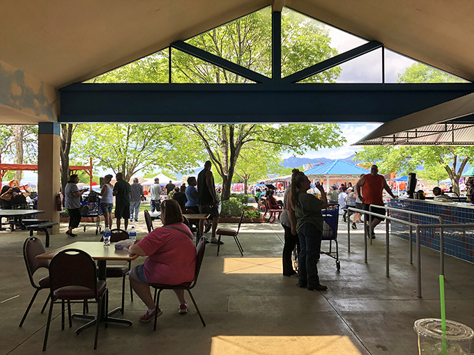 The covered dining area&mdash;neutral territory where tired shoppers refuel, compare finds, and strategize which section to conquer next.